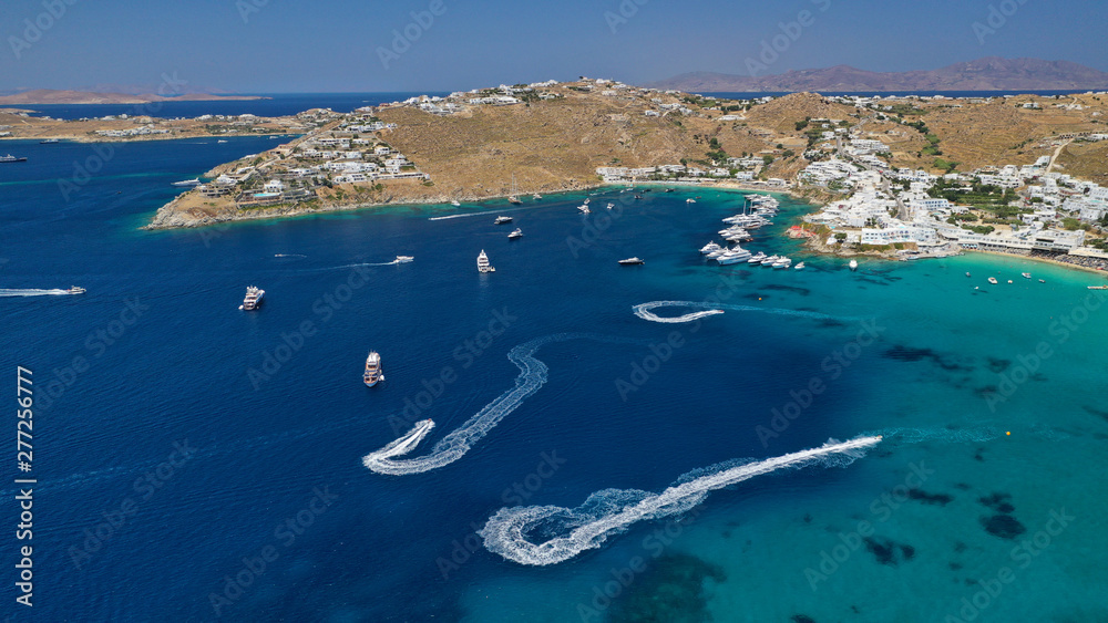 Aerial drone bird's eye view from famous beach of Paraga and Agia Anna ...