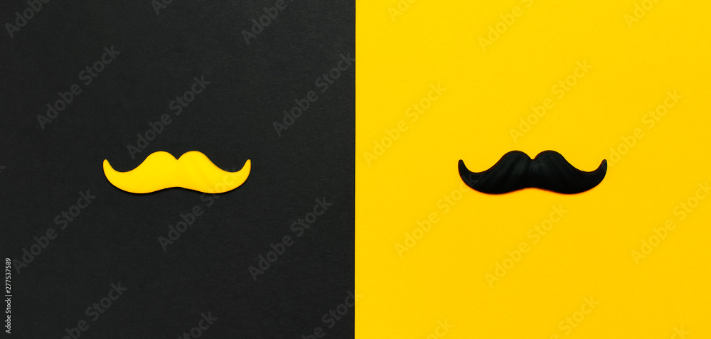 Creative party decoration concept. Black and yellow mustache, props for ...