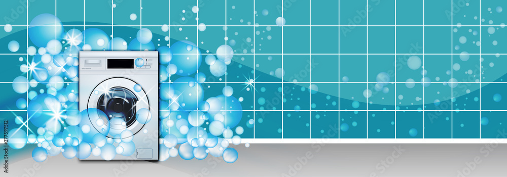 Washing machine front loading in empty laundry room background ...