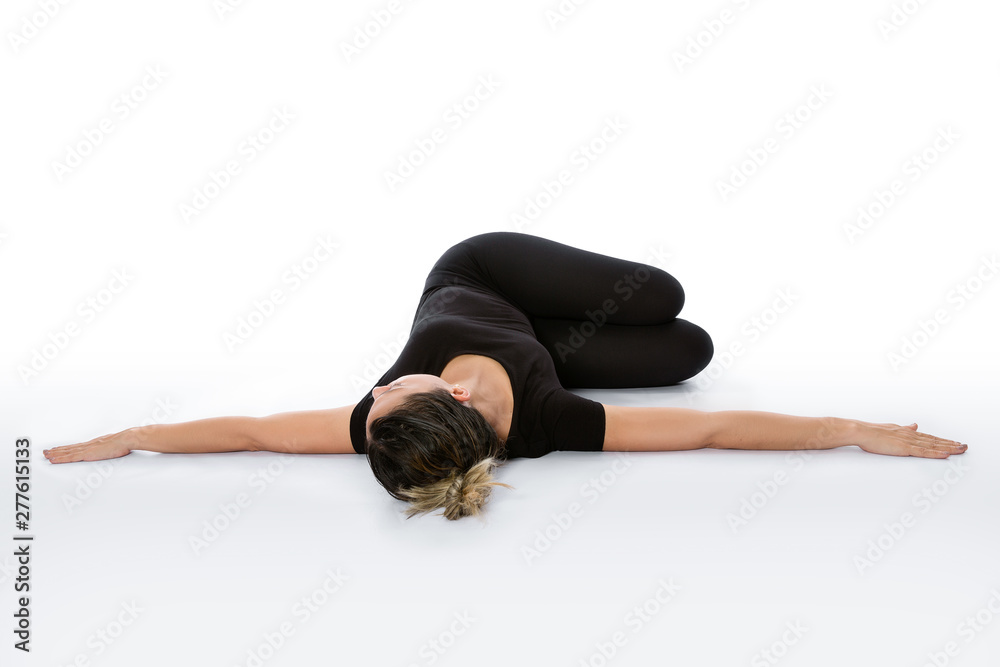 Supta Matsyendrasana yoga pose (Reclined Spinal Twist pose). Yoga poses ...