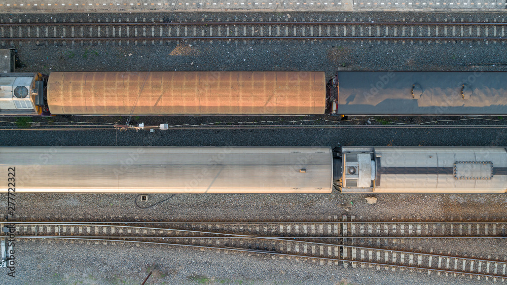 Aerial view of diesel locomotive Train and railway tracks - top view ...
