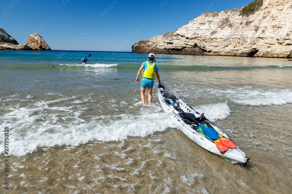 Open top kayaking near the scenic and Mediterranean-like Potato Bay ...