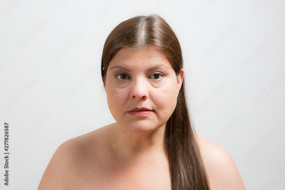 Rembrandt lighting in studio portrait. Main light on one side of face ...