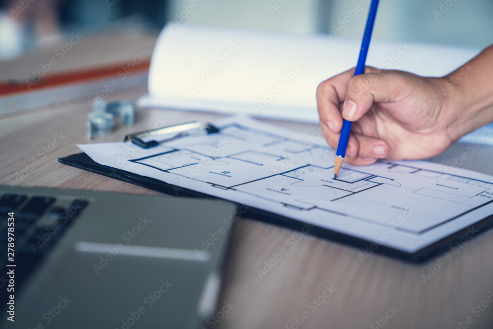 Architect & Engineer working drawing document about project planning ...
