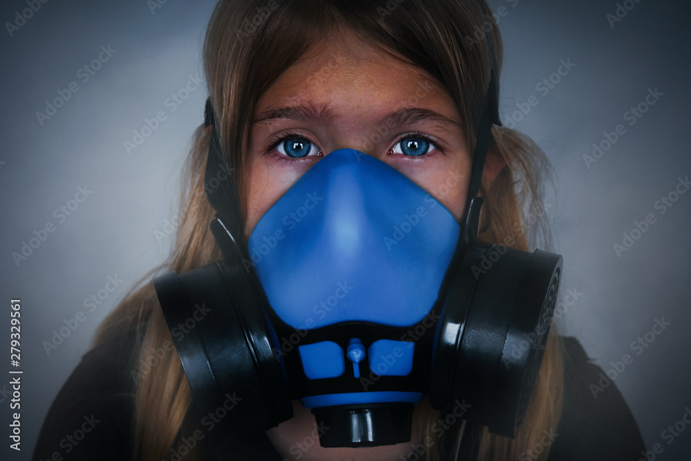 Young girl wearing gasmask, respirator portrait. Effects of worldwide ...