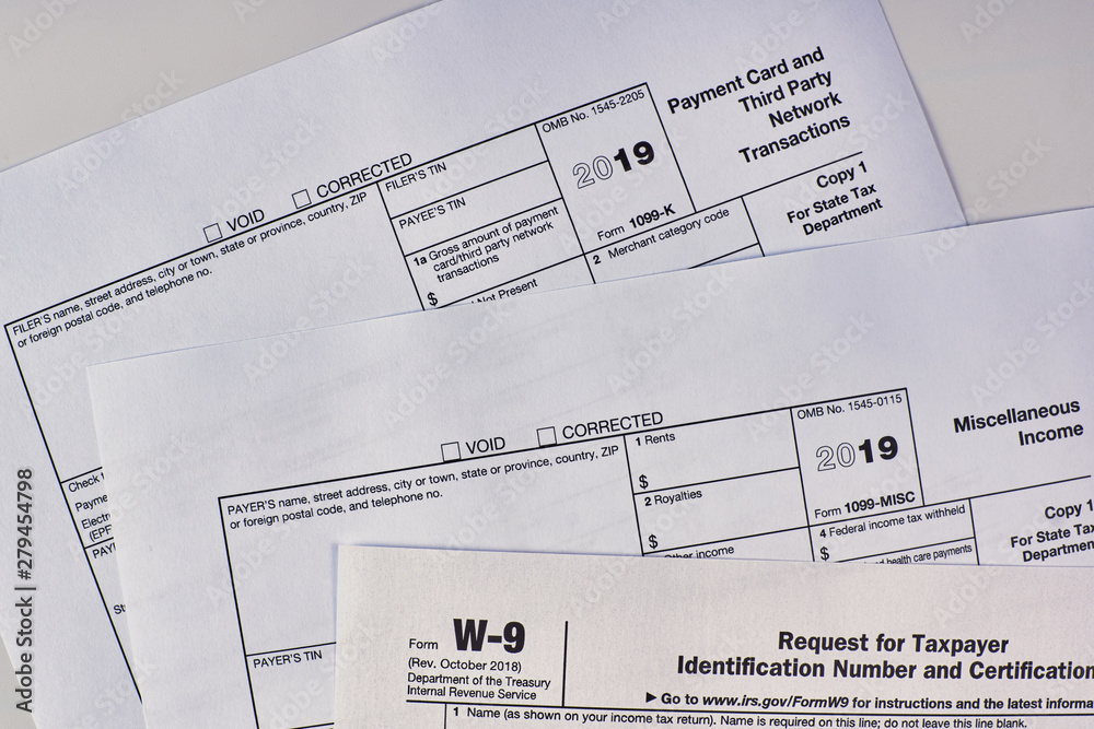 Tax Form w-9, 1099-misc, 1099-k on a white background Stock Photo | Adobe Stock