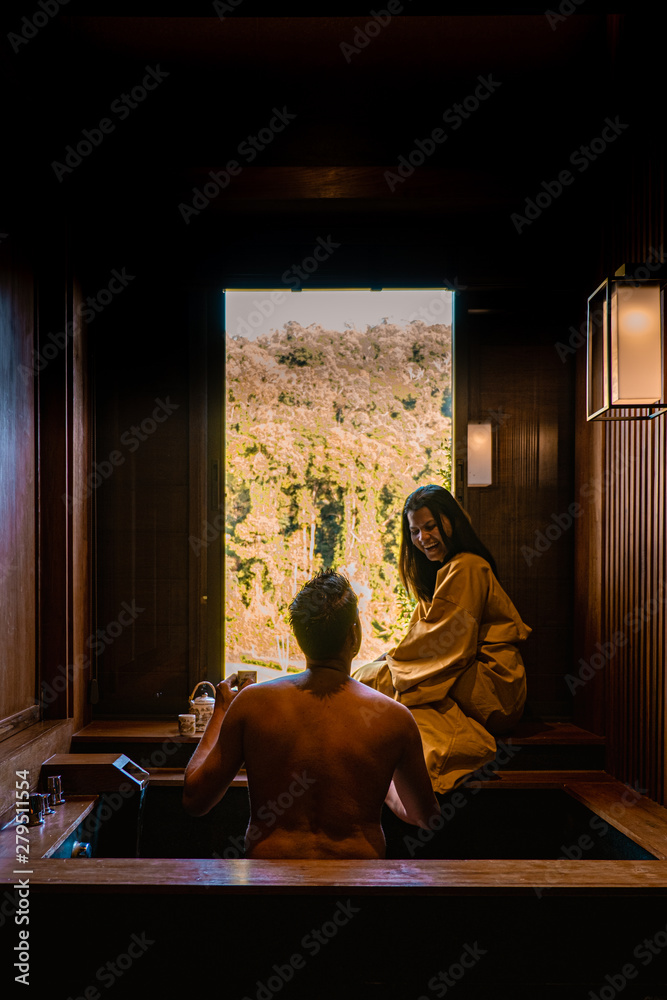 Japanese Onsen Spa, couple men and woman drinking thee Onsen Spa ...