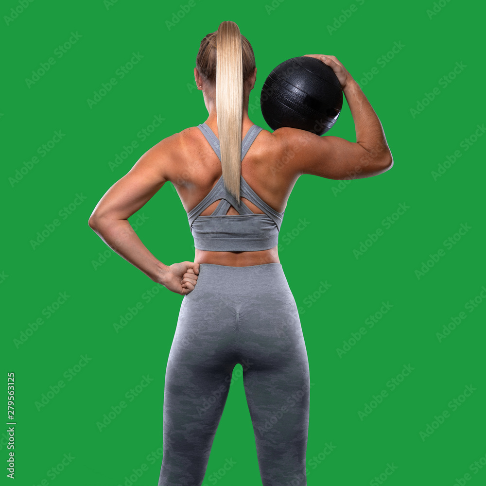 Backside view of female athlete fitness trainer athlete, muscular back ...