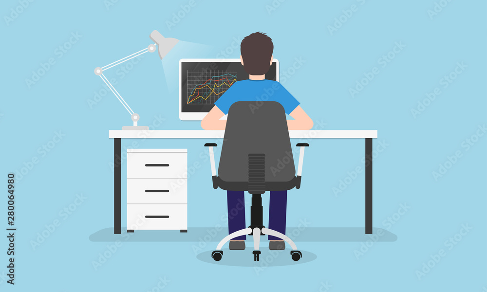 Man is working on the computer. Back view. Person sitting on a chair in ...