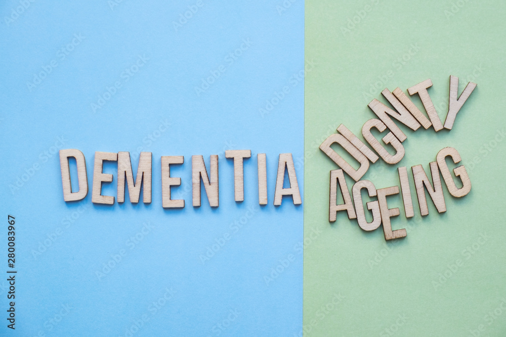 Dementia concept, word spelled out with dignity and ageing Stock Photo ...