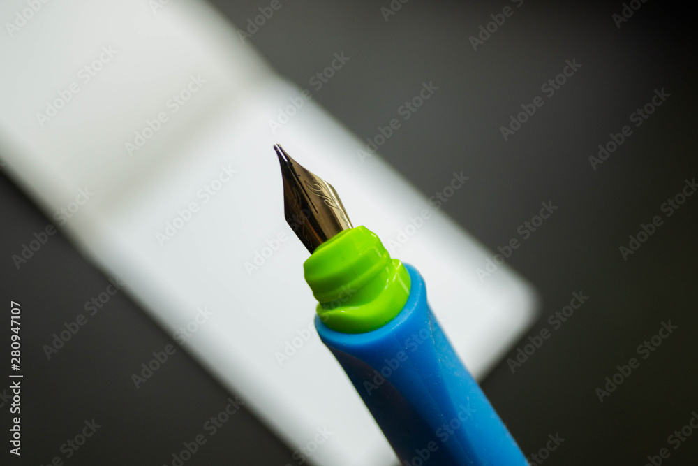 calligraphy pen, white note, mock up, place for text, black background ...