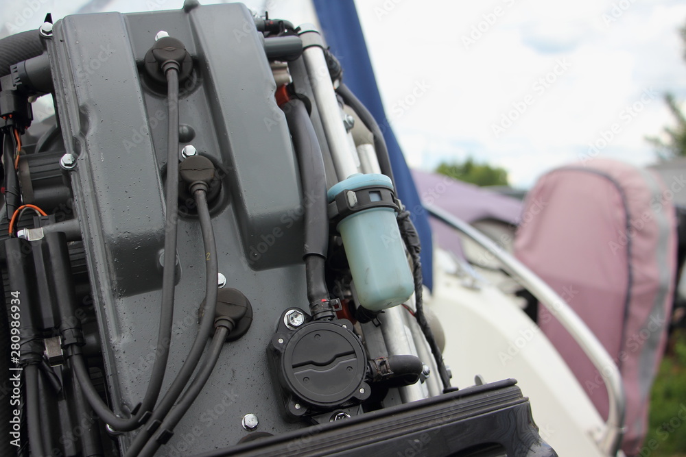 Rear side of boat transom four stroke 4 cylinder fuel injection ...