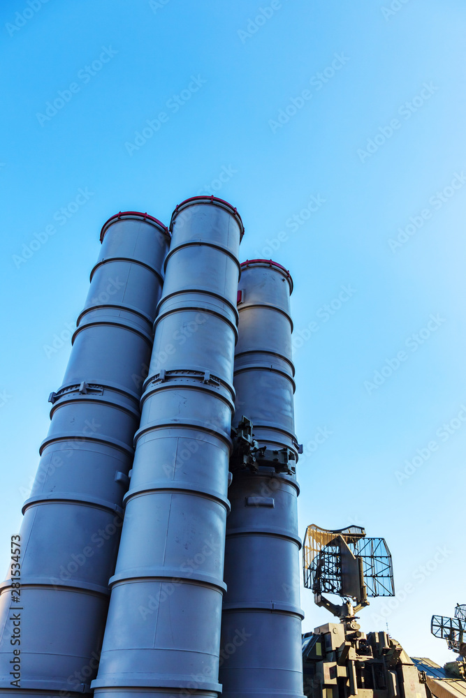 Missiles of the air defense system on blue sky background. Launcher air ...