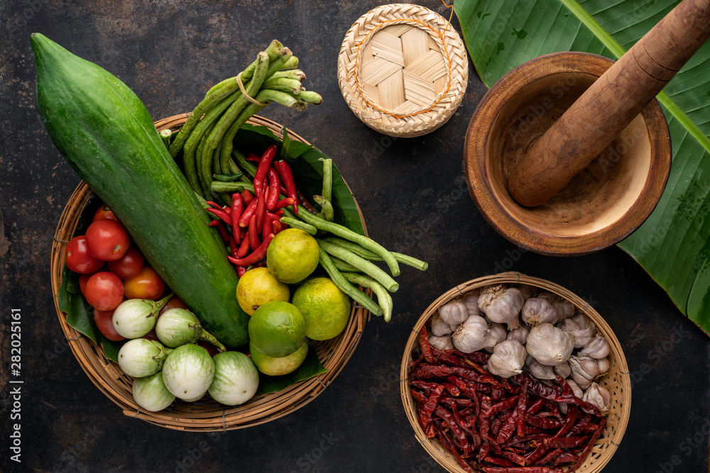 Som tum , papaya salad ingredients on dark background table, top view ...
