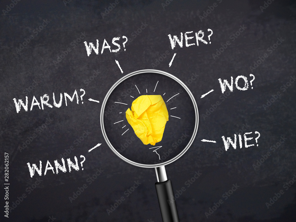 Stock-Foto „Lupe mit Papierkugel als Glühbirne und den Fragenwörtern ...