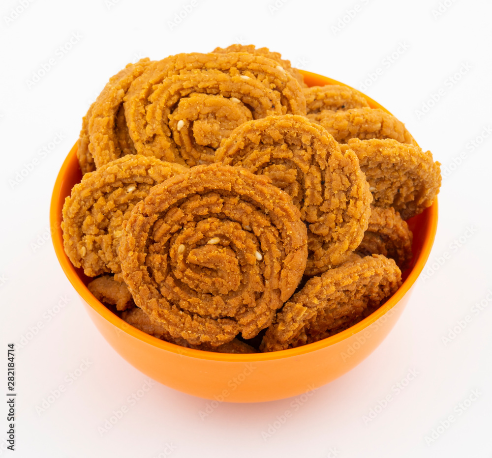 Indian Traditional Snack Chakli, a spiral shaped crisp deep fried snack ...