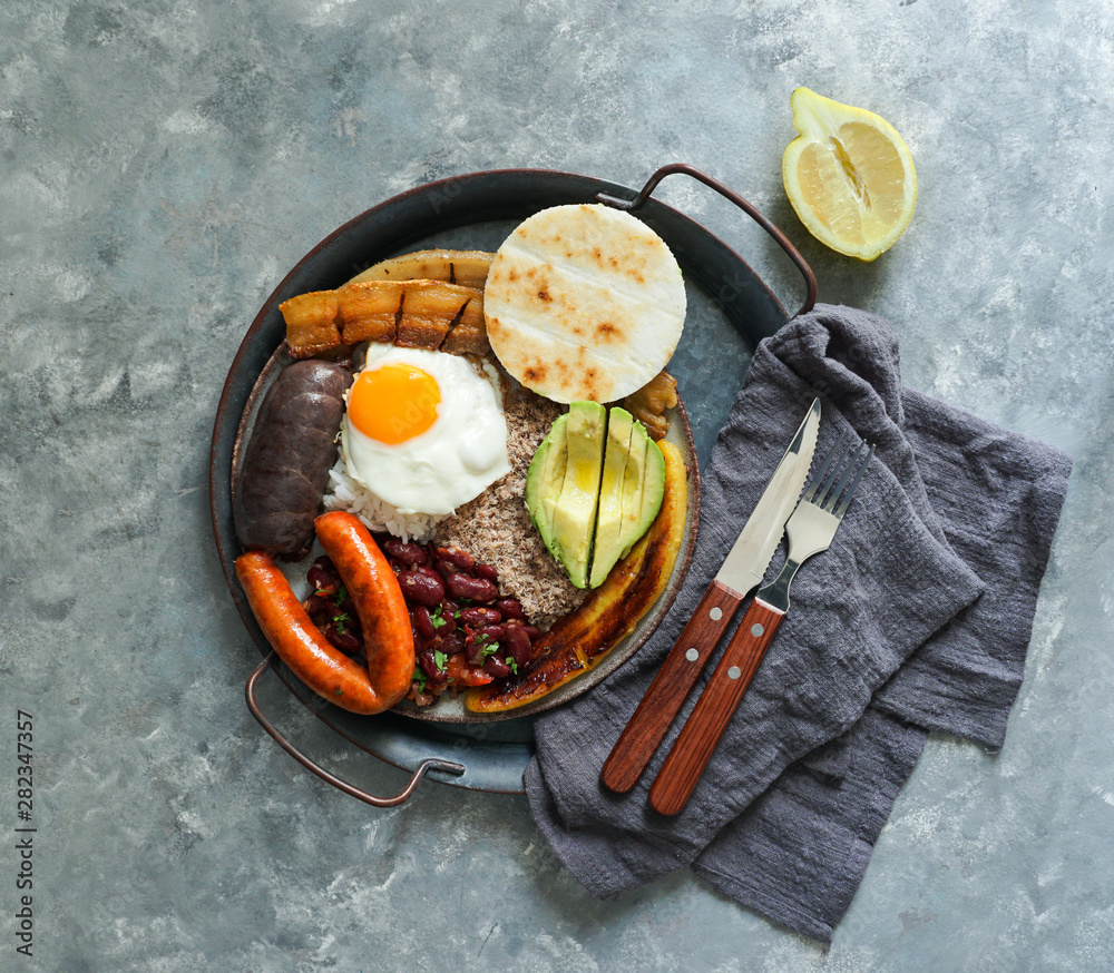 Colombian food. Bandeja paisa, typical dish at the Antioquia region of ...