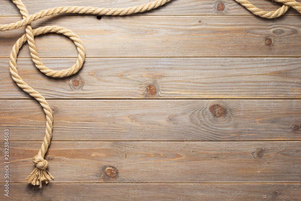 ship rope at wooden background texture Stock Photo | Adobe Stock