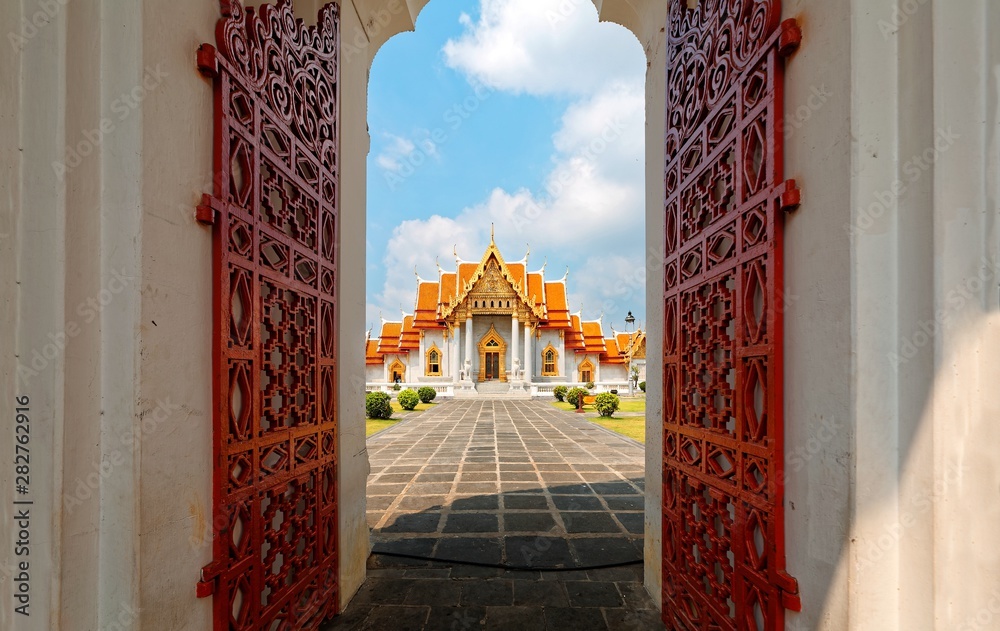 View through the entrance gate to Wat Benchamabophit or The Marble ...
