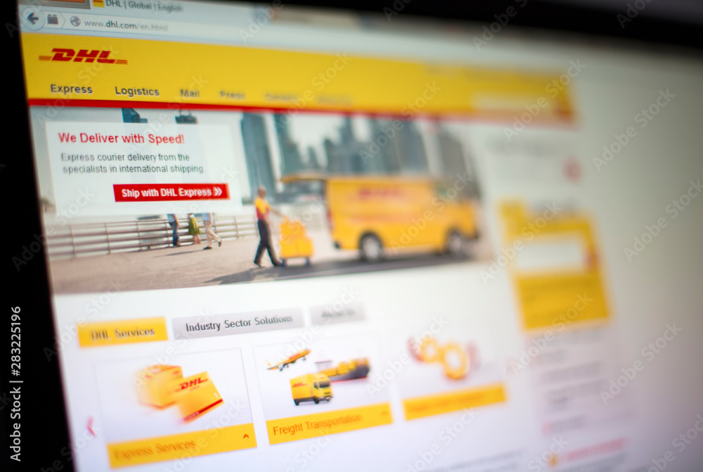 DHL website on the computer screen. DHL Express is a division of the ...