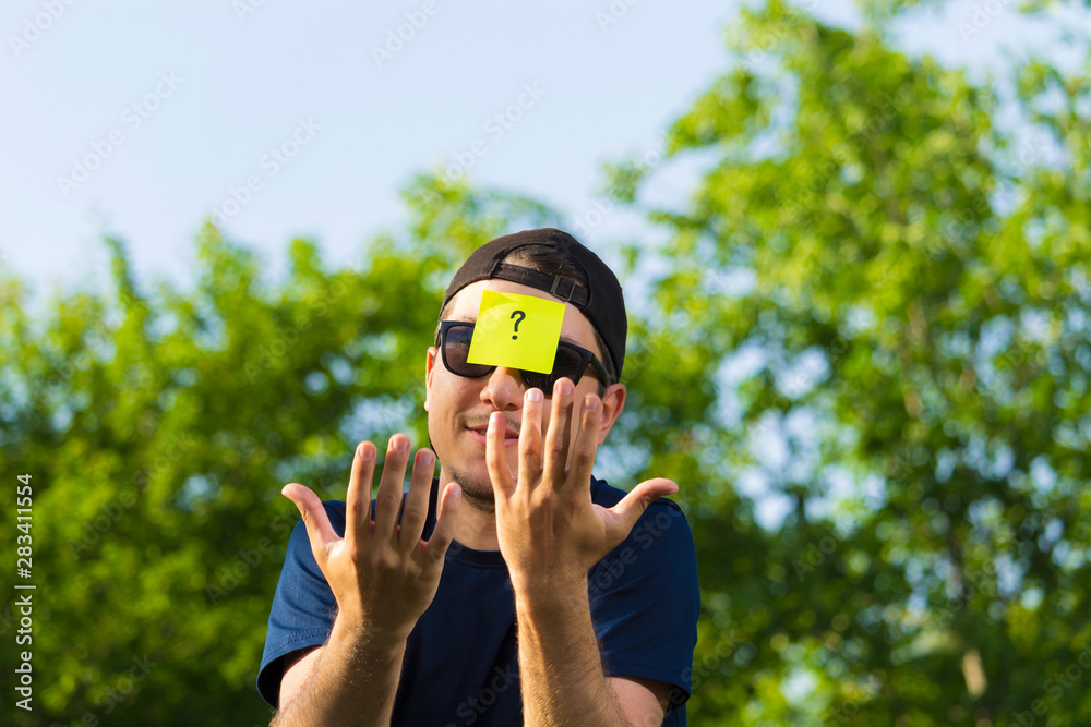 Sticker with a question mark on the forehead of a man. Concept: what ...