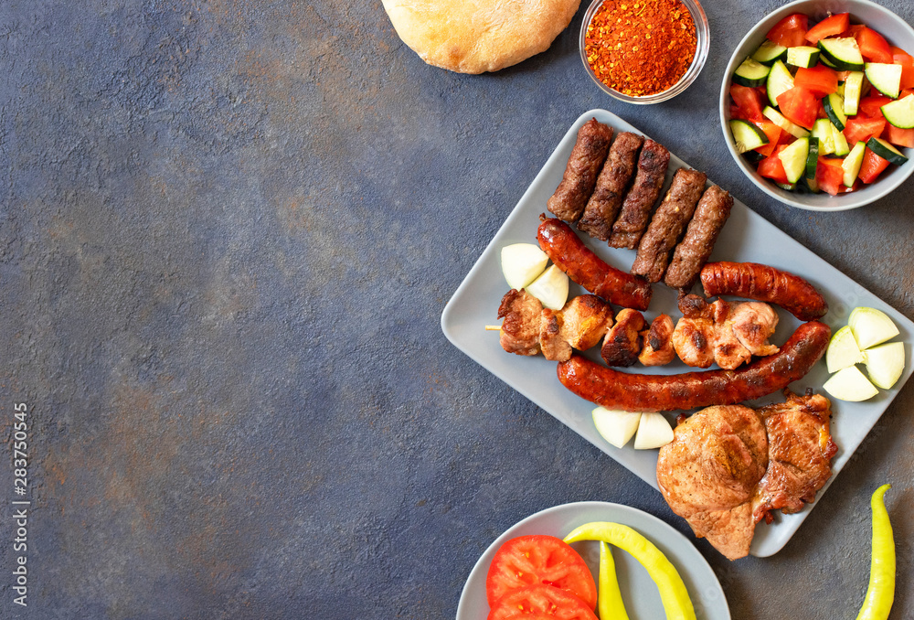 Traditional Serbian and Balkan grilled meat called mesano meso. Balkan ...