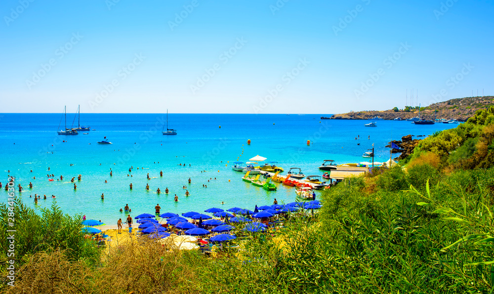 blue sea with clear water, mountains, yachts and the beach on the ...