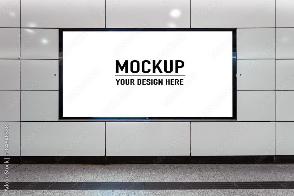 Blank billboard located in underground hall or subway for advertising ...