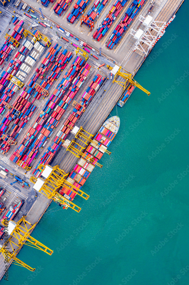 Top view of Deep water port with cargo ship and containers. It is an ...