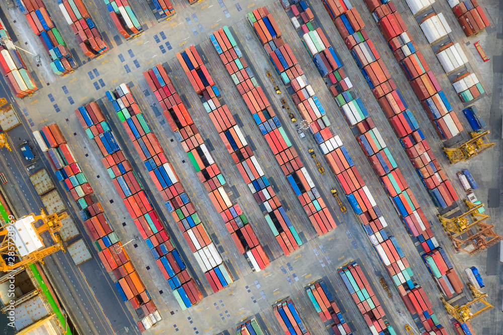 Container ship in export and import business logistics and ...