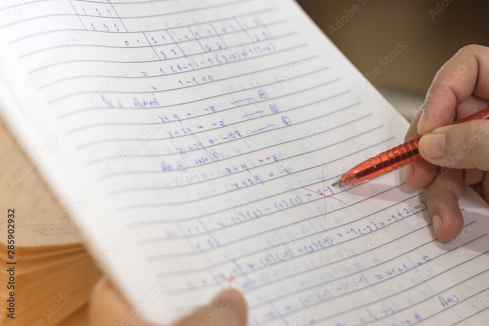 Foto de Stock Concept of measurement and evaluation. Hand of teacher ...