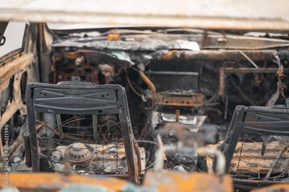 crushed melt car after deliberate arson. destroyed vehicle after a fire ...