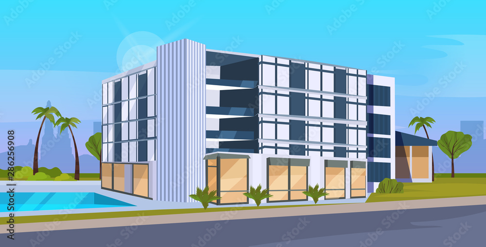 modern hotel office building exterior with large panoramic windows ...
