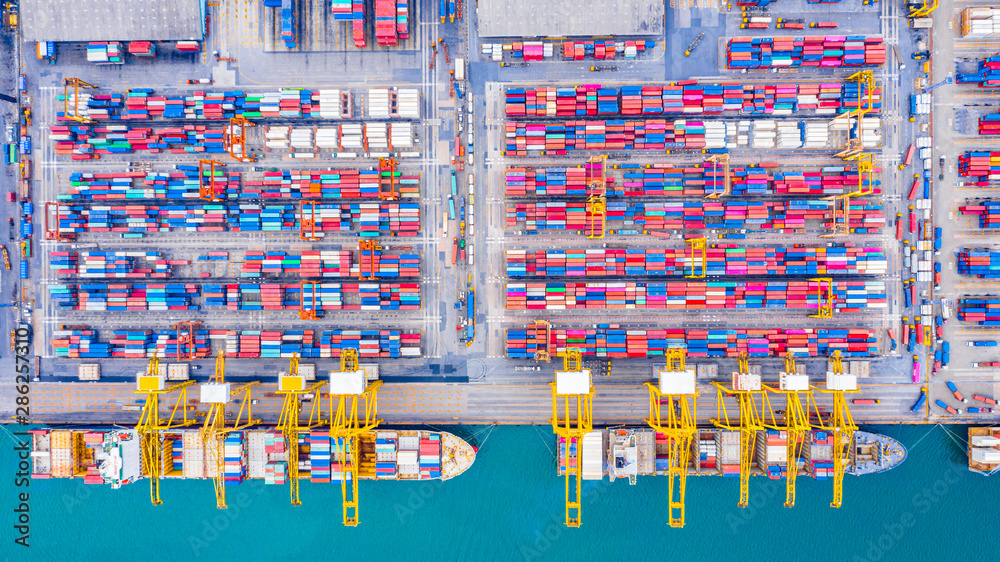 Top view of Deep water port with cargo ship and containers. It is an ...