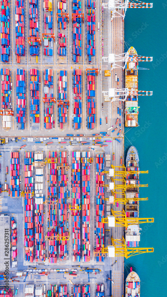 Top view of Deep water port with cargo ship and containers. It is an ...