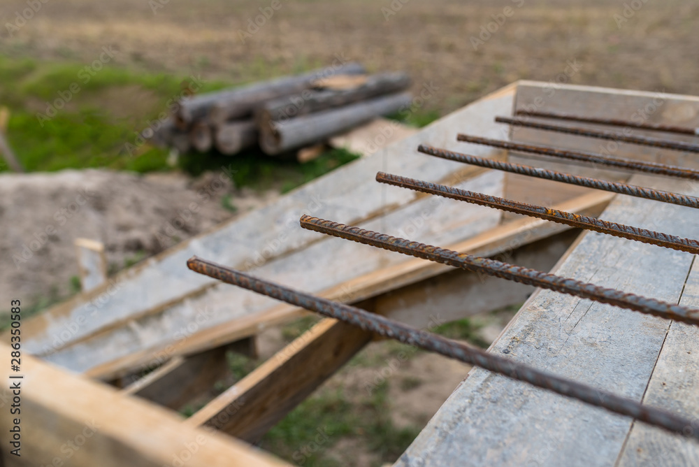 Reinforcing bars sticking out of reinforced concrete slab. Stock Photo ...