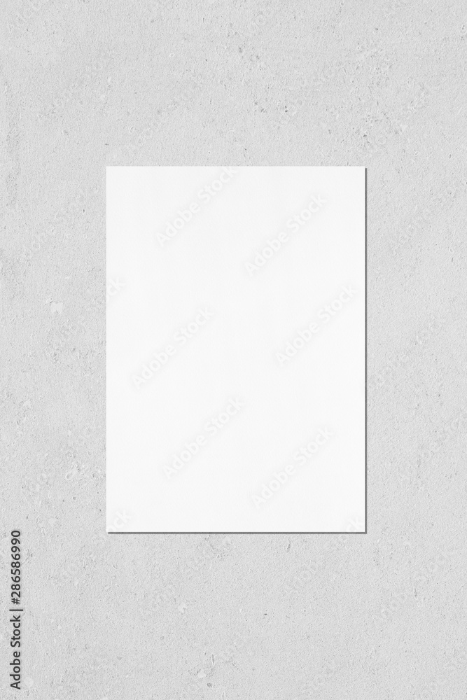 Empty white vertical rectangle poster mockup with soft shadow lying on ...