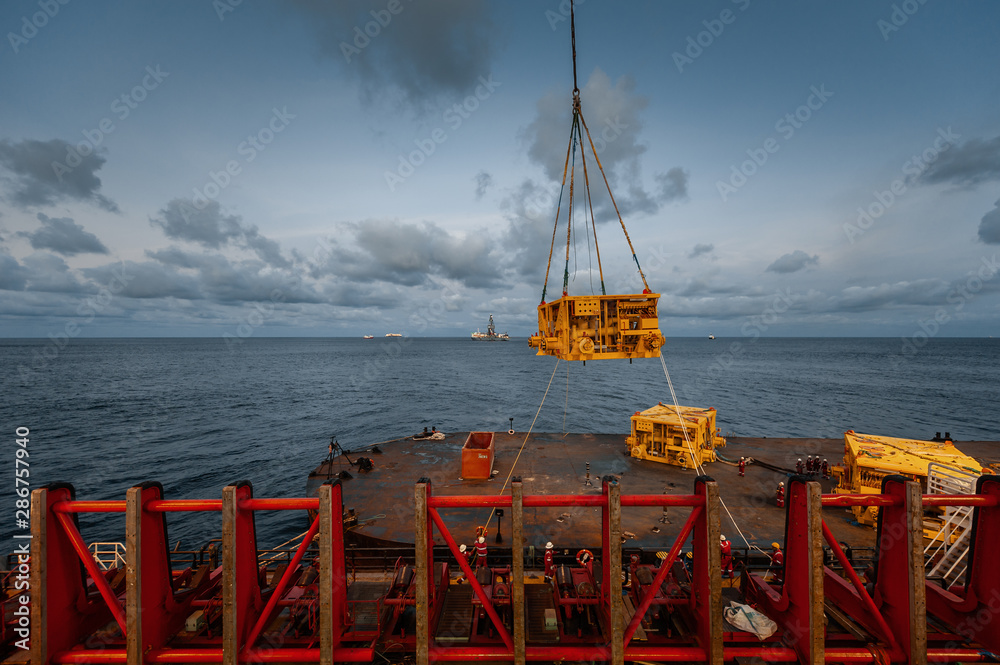 Lifting heavy load at offshore Stock Photo | Adobe Stock