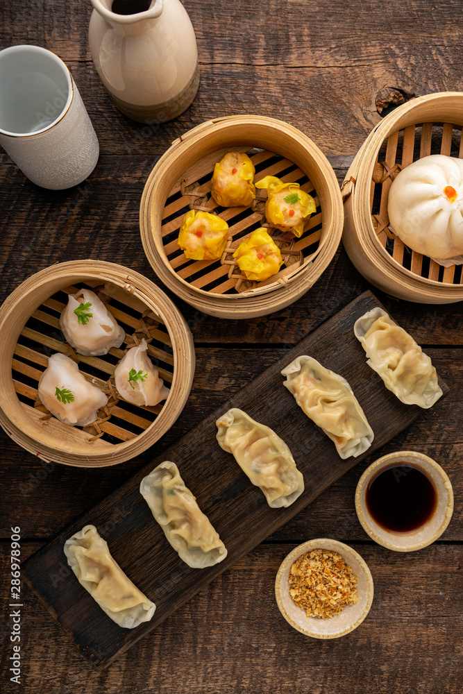 Dim sum, Dim Sum on the wooden table, top view and space for text input ...