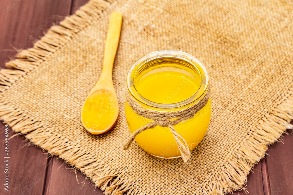 Pure or desi ghee (ghi), clarified melted butter Stock Photo | Adobe Stock