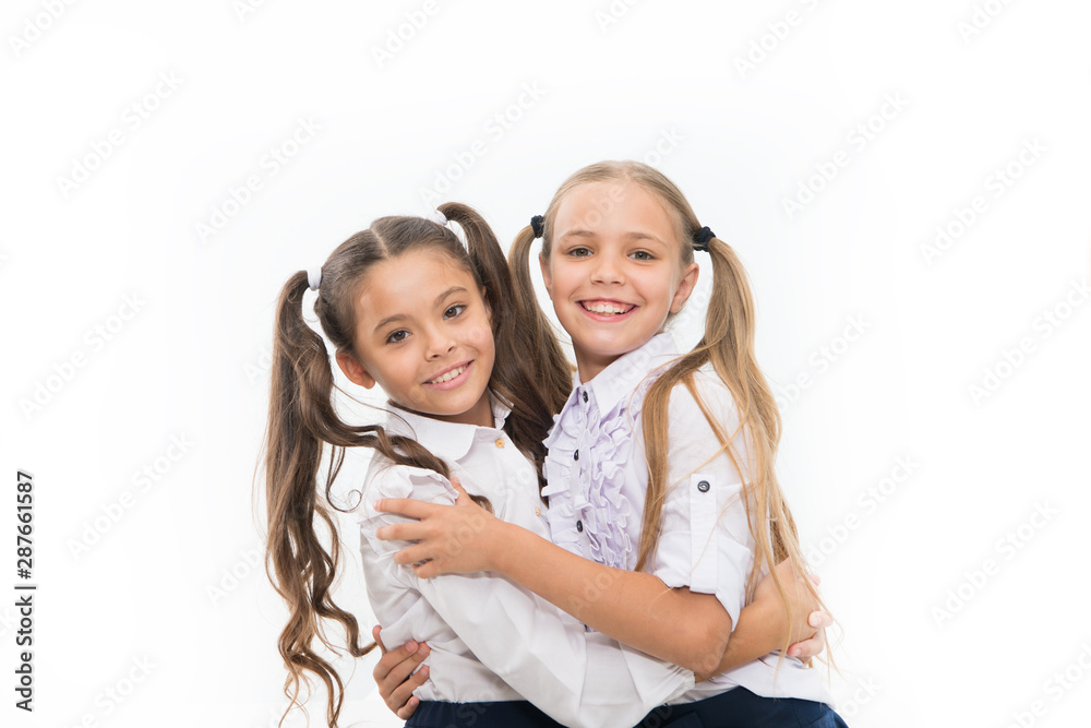 School friendship is so special. Adorable small friends hugging ...