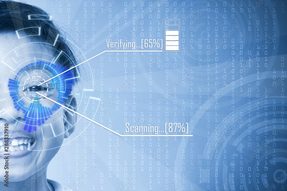 Biometric retina security scan concept. A little Asian male child with ...