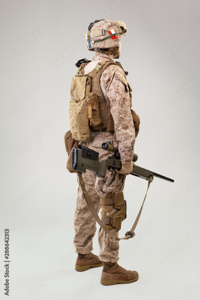 Studio shoot of modern infantry soldier, U.S. marine rifleman in combat ...