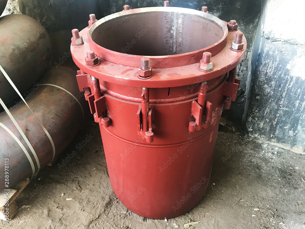 Red gland expansion joints for heating main. Stock Photo | Adobe Stock
