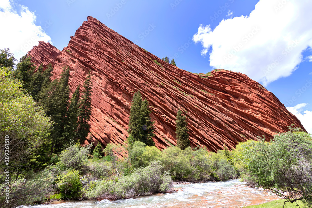 Side view of the Seven Bulls mountain ranges and the river in front of ...