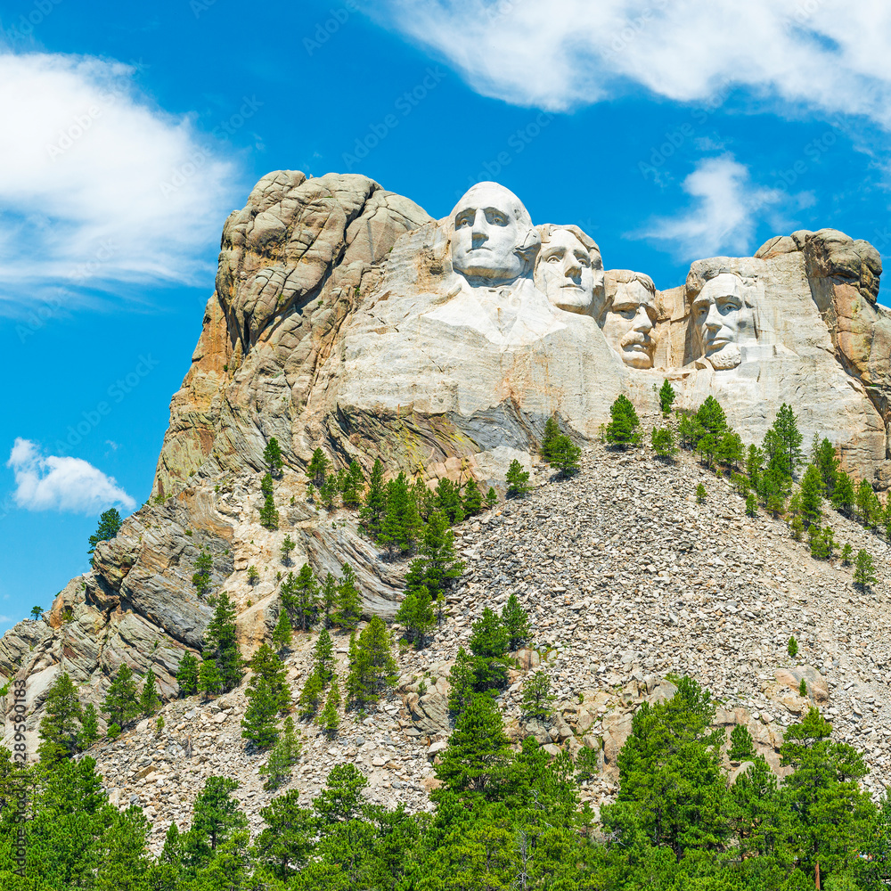 Square photograph of the carved faces of US presidents in Mount ...