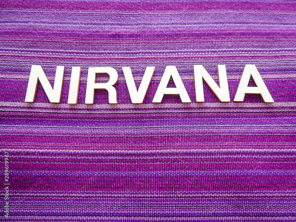 Wooden text letters with the Sanskrit word "NIRVANA" for a sign, banner ...