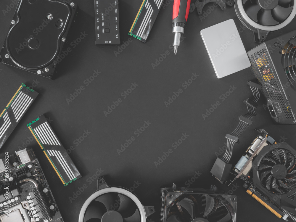 top view of computer parts with harddisk, ram, CPU, graphics card, and ...