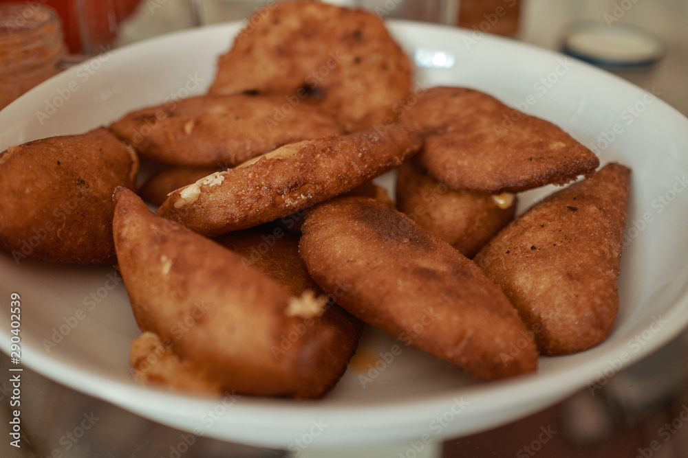 Venezuelan empanadas made of corn meal and stuffed with shredded beef ...