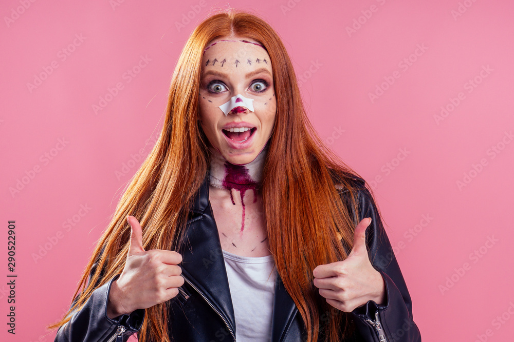 redhaired ginger biker woman wearing black leather jacket with blood ...